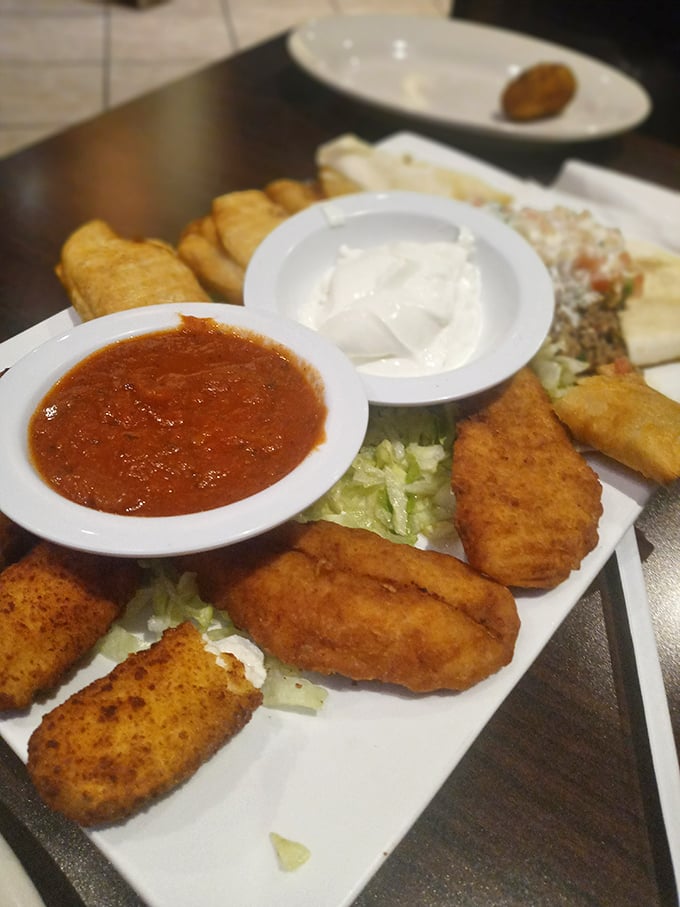 Golden mozzarella sticks arrive crispy and perfect, proving that comfort food knows no cultural boundaries here.