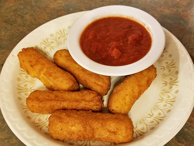 Golden-fried mozzarella sticks with marinara&mdash;the universal language of "yes, you deserve this today" spoken fluently at Coney Island Inn.