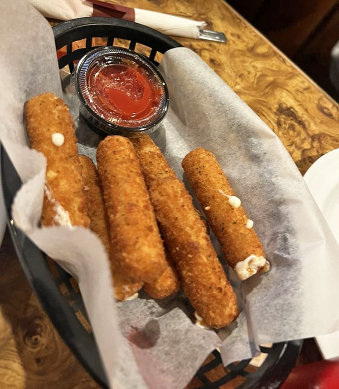 Golden-brown mozzarella sticks with that perfect cheese pull&mdash;the appetizer equivalent of a warm-up band that could headline its own show.