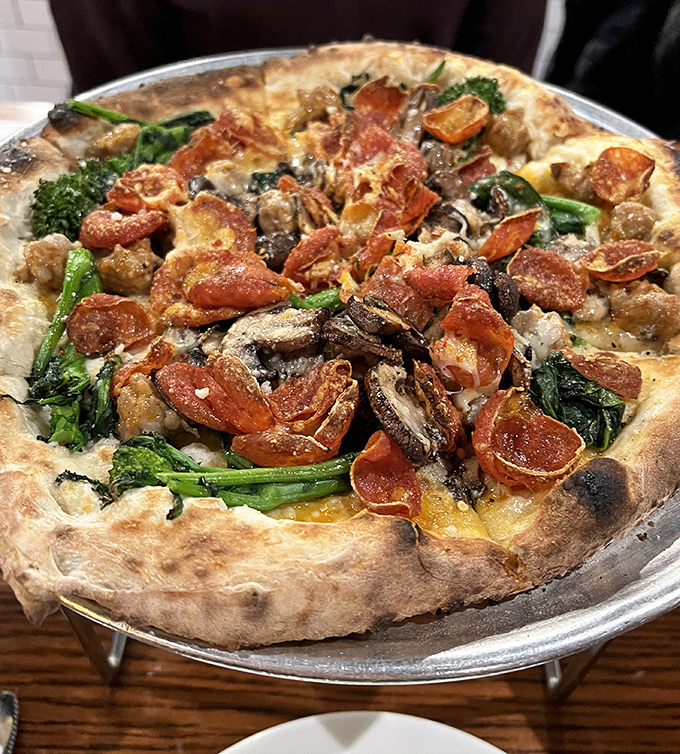 When mushrooms and greens join the pizza party, magic happens. This pie proves toppings can be both indulgent and virtuous.