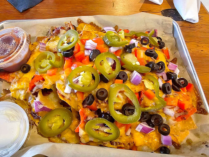 Loaded nachos that don't skimp on toppings&mdash;a mountain of jalape&ntilde;os, olives, and cheese that requires a strategic eating plan.