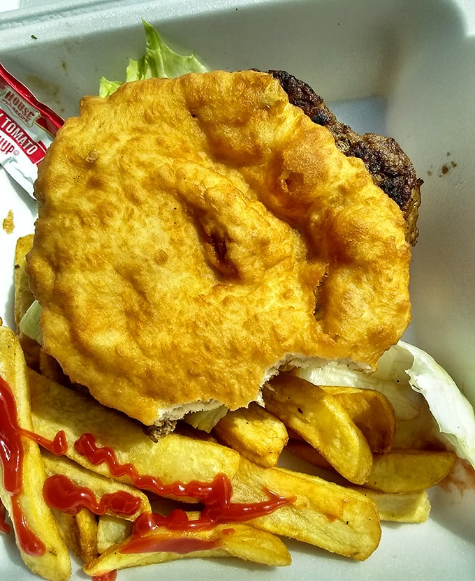 This burger arrived wearing frybread instead of a bun, like James Dean in a leather jacket.