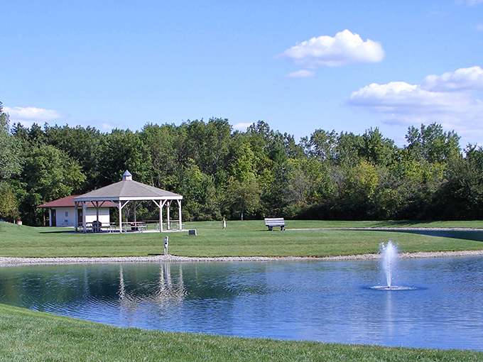 Oakwood Park's serene pond and gazebo create the perfect backdrop for everything from first dates to retirement celebrations—Norman Rockwell would approve.
