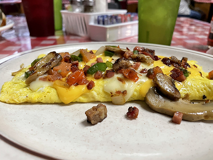 This isn't just an omelet&mdash;it's an edible mosaic of perfectly cooked eggs, melted cheese, and fresh ingredients that puts hotel breakfast buffets to shame.