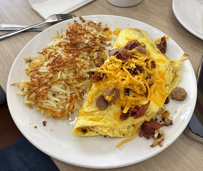 The Denver omelet that Denver wishes it made. Golden-folded eggs stuffed with savory fillings next to hash browns so perfectly crispy they deserve their own fan club. 
