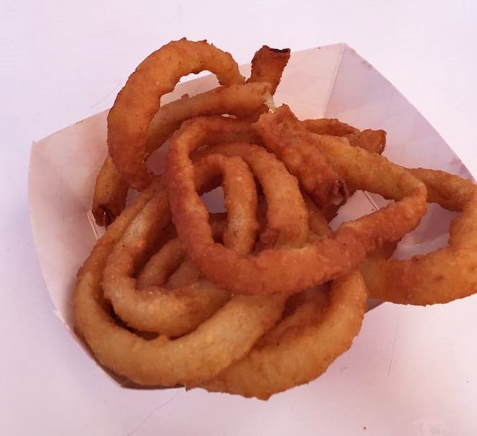 Onion rings at Pink's: circular proof that sometimes the simplest pleasures are the ones we drive across town for.