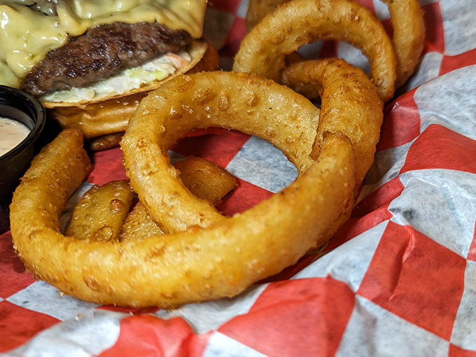 Onion rings that achieve the perfect crunch-to-tenderness ratio &ndash; the kind that make you temporarily forget your table manners.