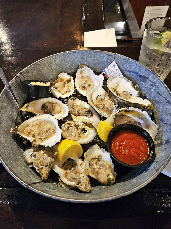 These oysters aren't just served &ndash; they're presented like jewelry on a metal platter, briny gems waiting to slide down your throat.