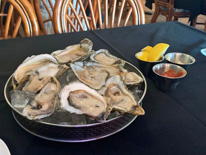 Fresh oysters on ice &ndash; nature's perfect appetizer. Like little cups of ocean essence waiting for a squeeze of lemon.