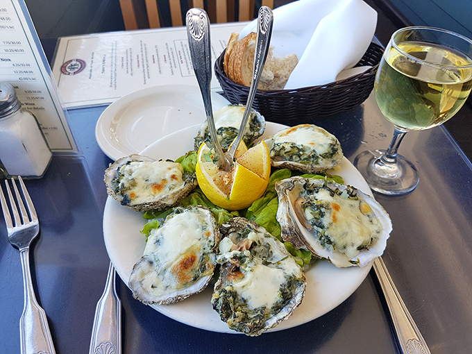 These Oysters Rockefeller are dressed better than most people at the opera. The spinach-butter topping melts into the briny jewels beneath.