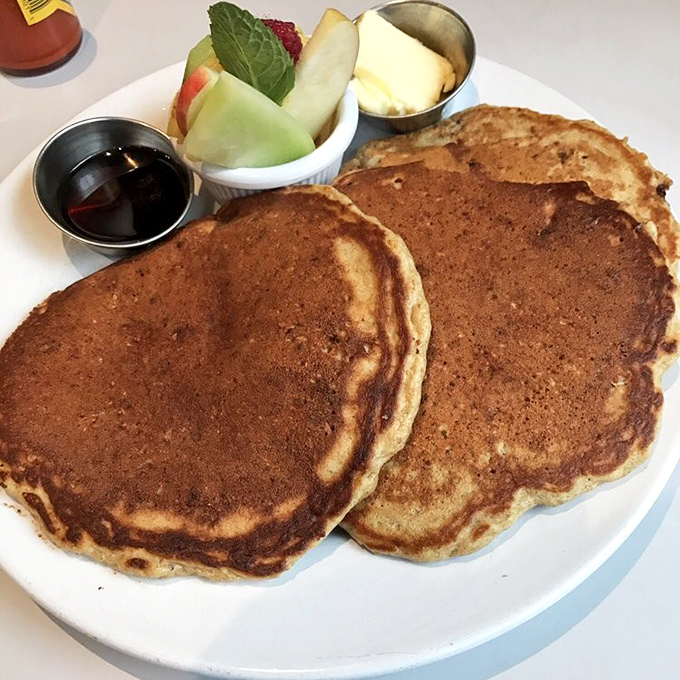 These pancakes aren't just breakfast, they're an event &ndash; golden-brown, fluffy, and served with fresh fruit that makes you feel slightly virtuous.