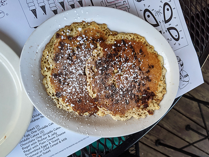 These pancakes aren't just breakfast, they're an event&mdash;dusted with powdered sugar and ready to soak up maple syrup like they were born for it.