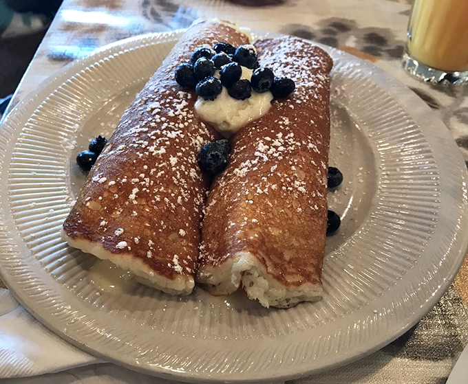 Blueberries and cream transform ordinary pancakes into something worth setting your alarm for, even on a Saturday.