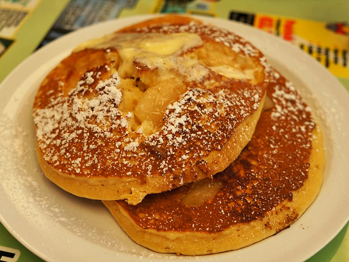 These pancakes aren't just breakfast, they're edible pillows of joy dusted with powdered sugar that would make your grandmother proud.