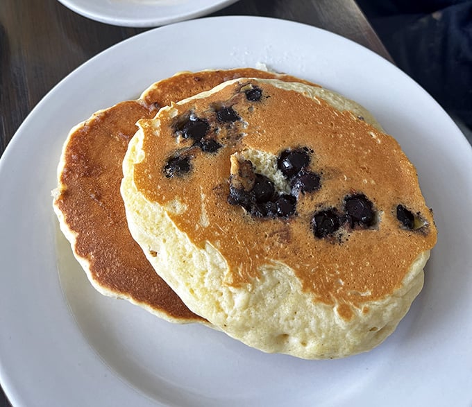 Blueberry pancakes that achieve the impossible: fluffy enough for clouds to be jealous, yet substantial enough to satisfy a lumberjack.