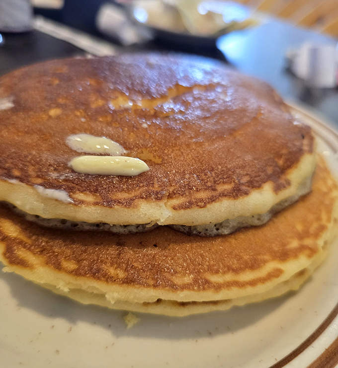 Fluffy pancakes that could double as pillows if they weren't so irresistibly edible.