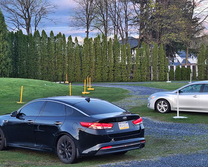 Cars nestled into their spots like puzzle pieces, each with the perfect view. The art of drive-in parking hasn't changed since your parents' first date.