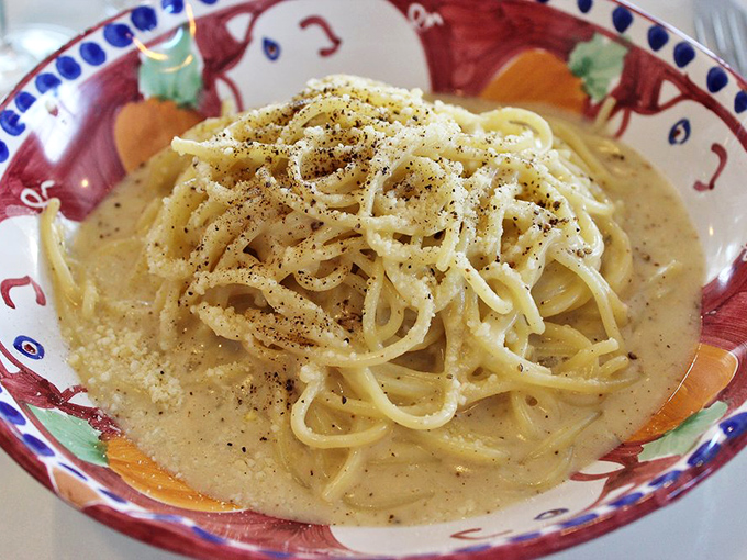 Cacio e Pepe so creamy it could make a Roman weep with joy &ndash; simple ingredients transformed into pure comfort in a colorful, hand-painted bowl.