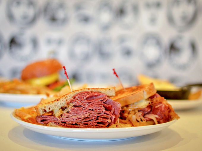This isn't just a sandwich; it's a pastrami skyscraper. Stacked higher than Cleveland's Terminal Tower and twice as impressive to locals.