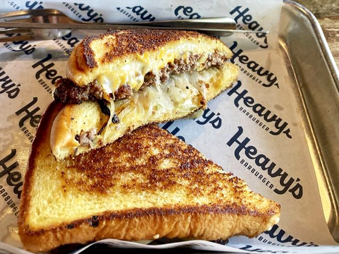 The patty melt at Heavy's doesn't just flirt with perfection &ndash; it's in a committed relationship with it. Toasty, cheesy heaven.