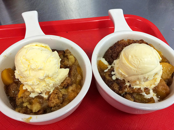 Warm peach cobbler crowned with melting vanilla ice cream&mdash;proof that Georgia's fruit can find its highest calling in dessert form.