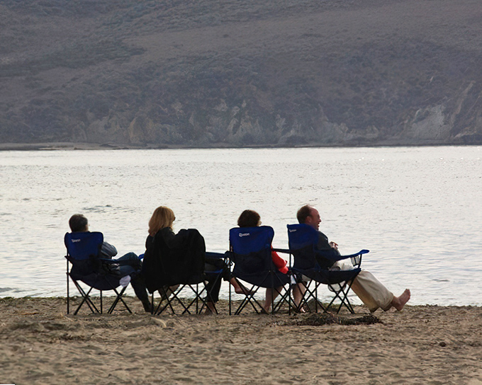 Beach chairs positioned for maximum relaxation potential – these folks have figured out the good life.
