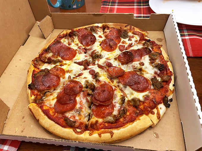 Pizza purists rejoice! This pepperoni pie delivers that perfect balance of crispy, chewy, saucy, and cheesy that haunts your dreams.