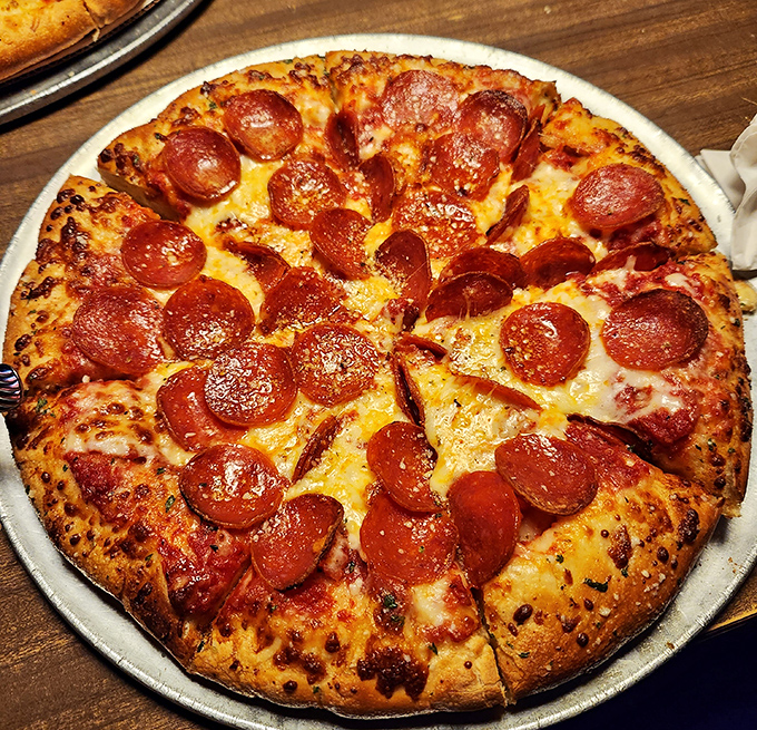 A perfect pepperoni pizza that doesn't need fancy words to describe it &ndash; just look at that cheese pull and those perfectly crisped edges.