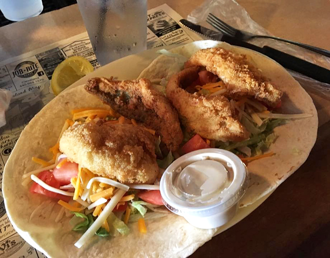 Perch tacos &ndash; because sometimes even perfection can be improved by wrapping it in a tortilla with fresh veggies and a dollop of creamy sauce.