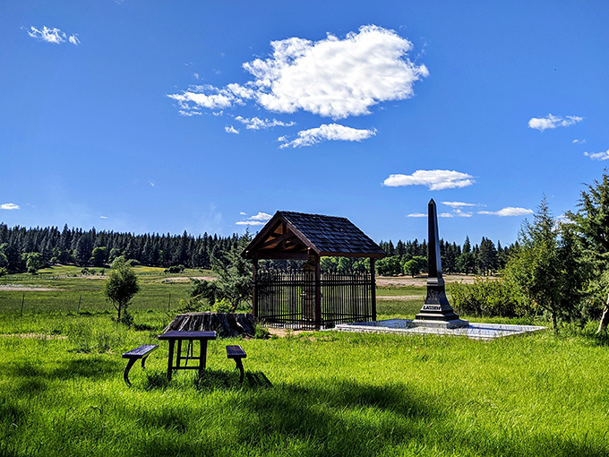 A peaceful memorial site with picnic table included&mdash;because contemplating history works up an appetite in mountain country.