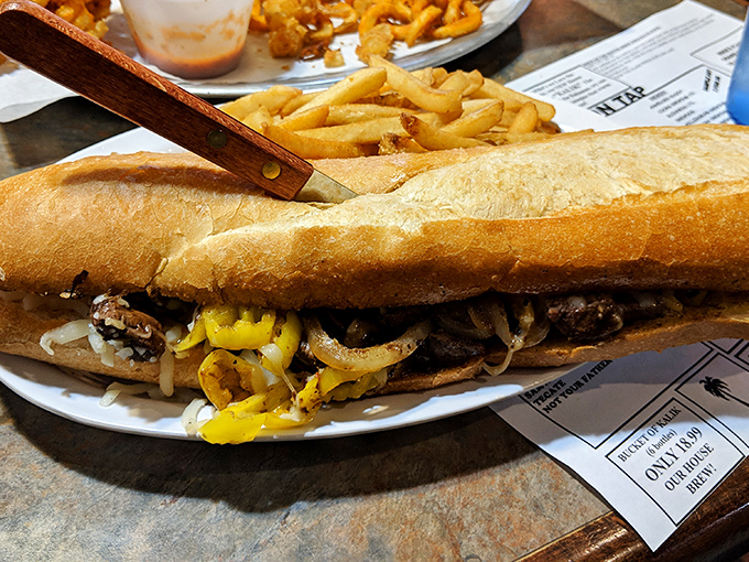 This isn't just a sandwich—it's an engineering marvel of beef, cheese, and bread that requires both hands and total commitment.