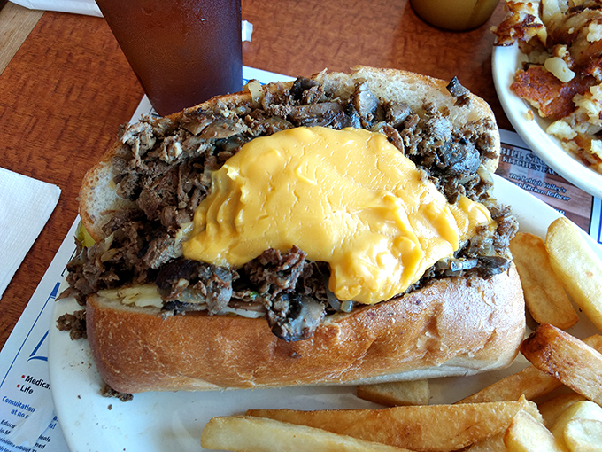 Not just a sandwich, but a Philly Cheesesteak masterpiece. Thinly sliced beef smothered in melted cheese&mdash;a true Pennsylvania handshake between bread.