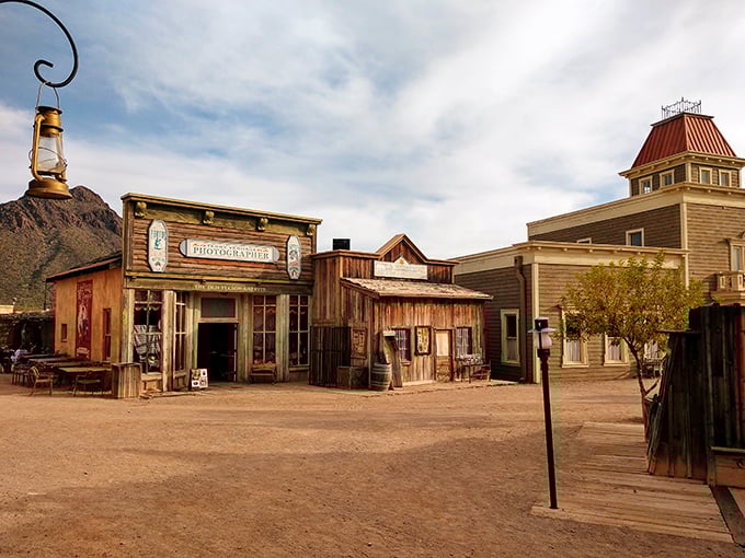 Step into the past at the photographer's studio, where you can capture your Wild West persona without the three-month wait time of 1880s technology.