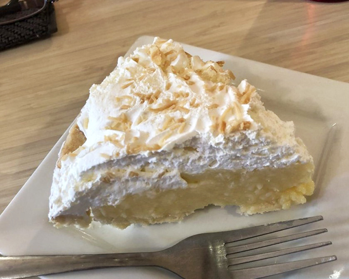 This isn't just pie&mdash;it's a towering monument to the art of dessert-making, where clouds of whipped cream meet velvety filling in perfect harmony.