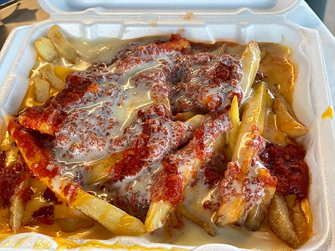 Cheese fries that could make a cardiologist weep&mdash;golden, crispy potatoes swimming in a lava flow of molten cheese and sauce.
