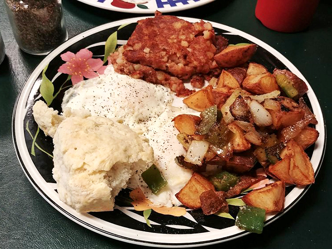 A breakfast symphony of eggs, hash browns, and corned beef hash that hits all the right notes before noon.