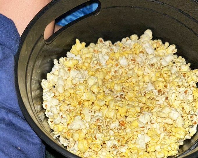 Fresh popcorn tumbles in the kettle, creating that irresistible aroma that makes every movie taste better.
