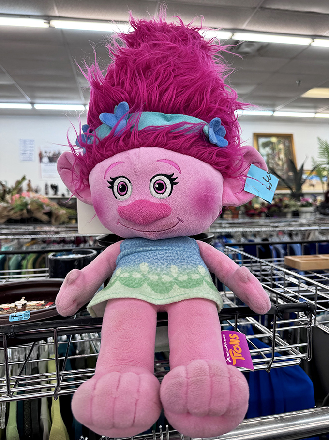 This vibrant Trolls character plush toy still sports its original tags&mdash;proof that "pre-loved" sometimes means "never actually played with."