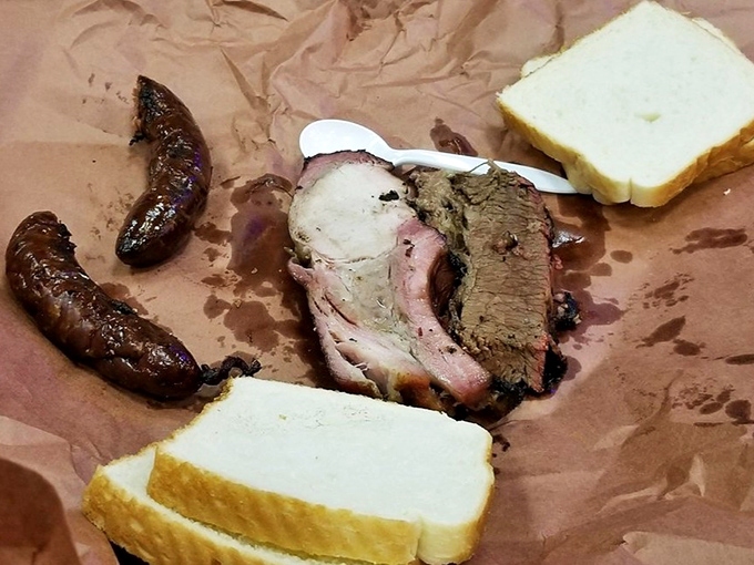 Thick-cut pork chops with a smoke ring that could make a jeweler weep with envy.