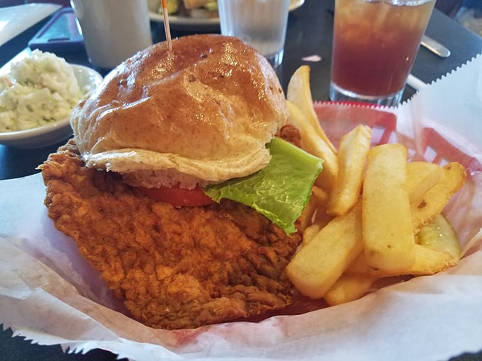 This isn't just a sandwich; it's Indiana's iconic pork tenderloin in its natural habitat&mdash;gloriously oversized and perfectly crisp.