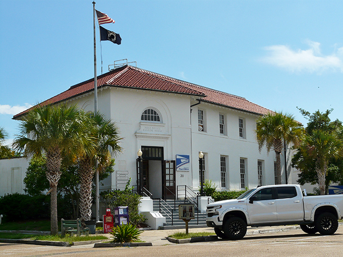 The stately Apalachicola Post Office, a gleaming white reminder that before emails and texts, people wrote letters worth traveling in style.