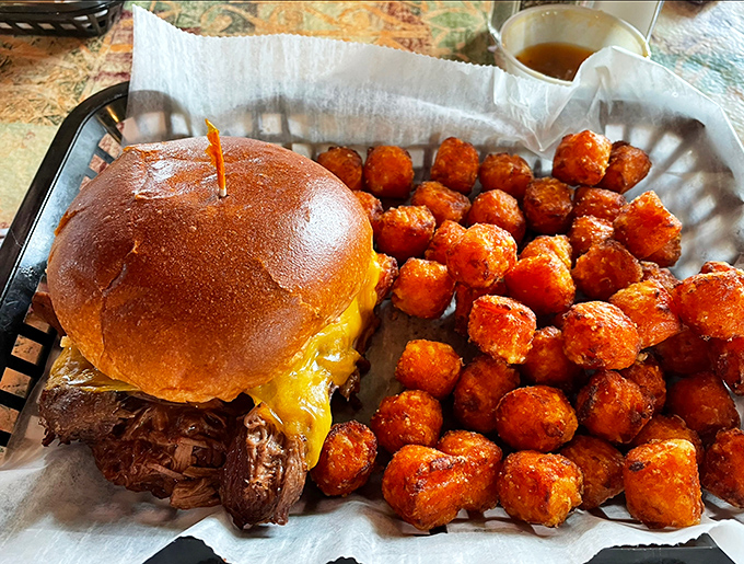A sandwich that answers the eternal question: "What if comfort food had an advanced degree?" Sweet potato tots that deserve their own fan club.