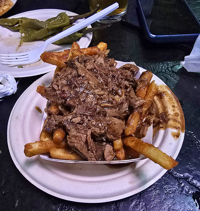 Behold the ultimate comfort food alchemy&mdash;golden fries transformed by slow-roasted beef and savory gravy into something that makes you question all other food choices.