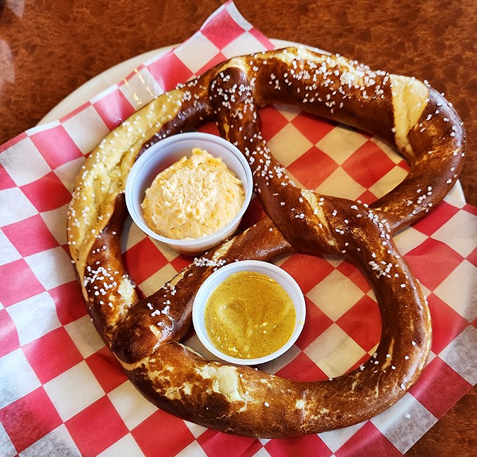 This isn't just a pretzel&mdash;it's architectural genius with salt crystals, served with dips that make you question all other pretzel experiences. 