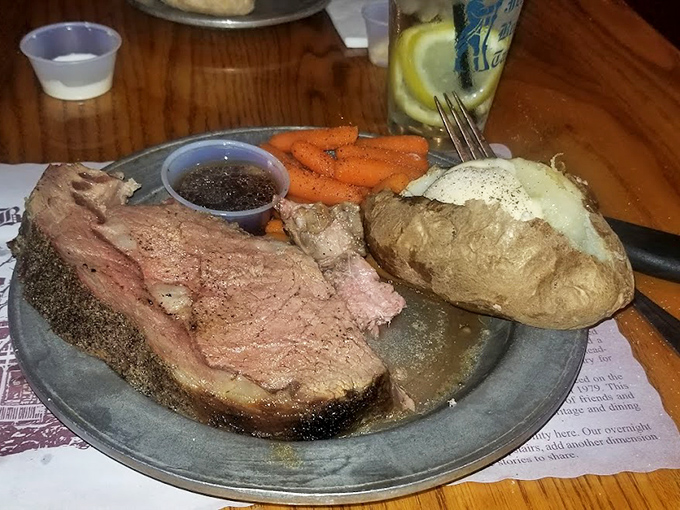 Prime rib that doesn't just meet expectations but throws them a surprise party, accompanied by a baked potato that's achieved its final form.