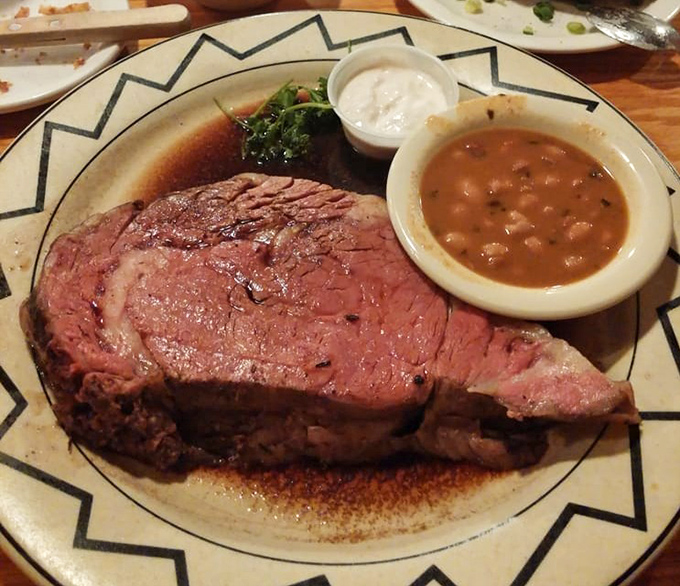 Prime rib so perfectly pink it could make a vegetarian question their life choices. Those cowboy beans aren't just a side dish &ndash; they're a revelation.