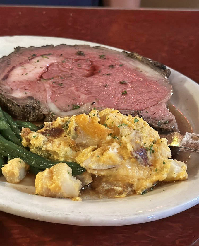 This prime rib isn't just cooked&mdash;it's been lovingly persuaded to perfection. The rosy center practically whispers "you made the right choice" with every bite.