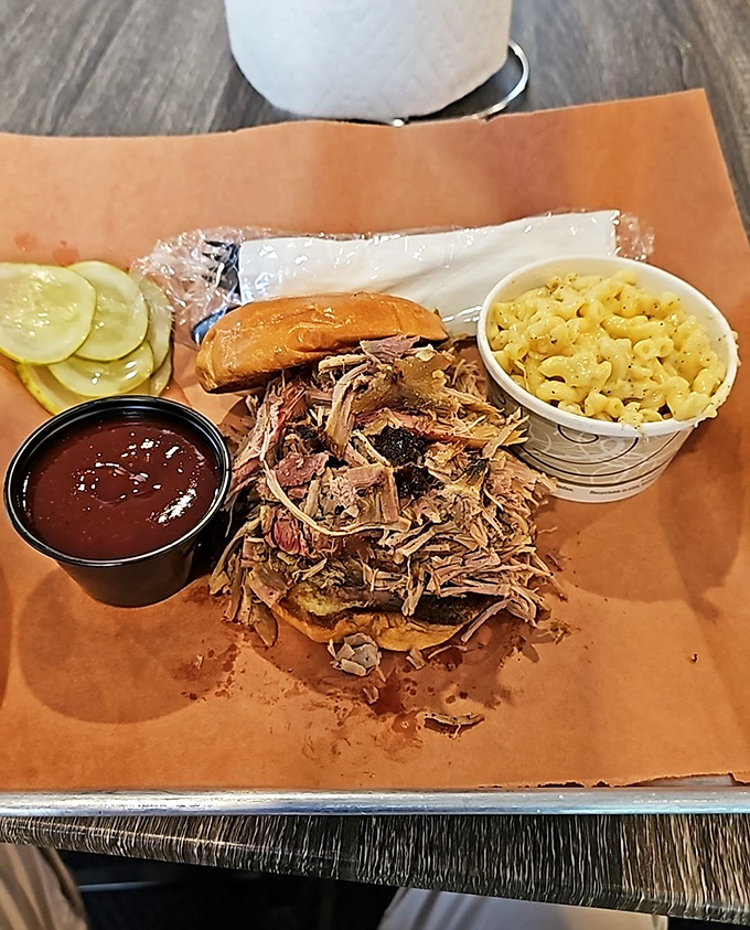 Pulled pork so tender it practically surrenders to your fork, served with mac and cheese that refuses to be upstaged.