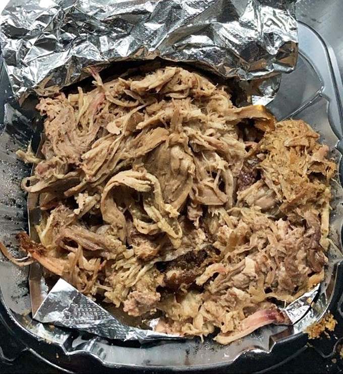 Pulled pork so tender it practically pulled itself. This isn't just meat&mdash;it's a masterclass in patience, smoke, and knowing when to leave well enough alone.