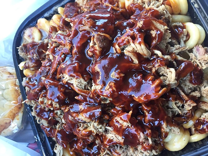 Pulled pork drowning in sauce is like a warm hug for your taste buds. The kind of comfort food that makes you want to call your mother and thank her.